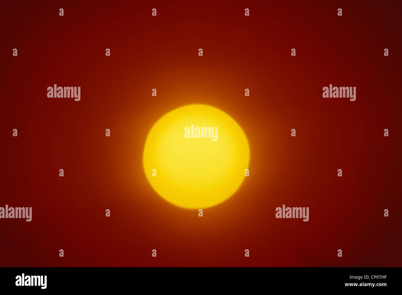 LARGE SUN ALONE ON CLEAR ORANGE SKY WITHOUT HORIZON Stock Photo - Alamy