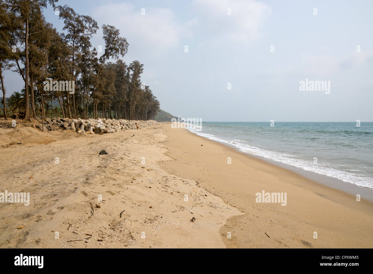 Coastal erosion a Keri Beach (Querim Beach) . The northernmost tip of ...