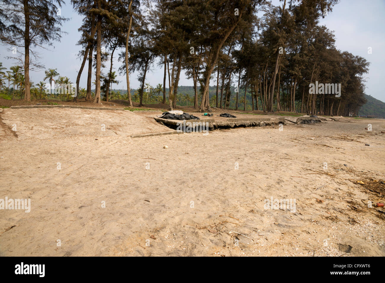 Coastal erosion a Keri Beach (Querim Beach) . The northernmost tip of ...