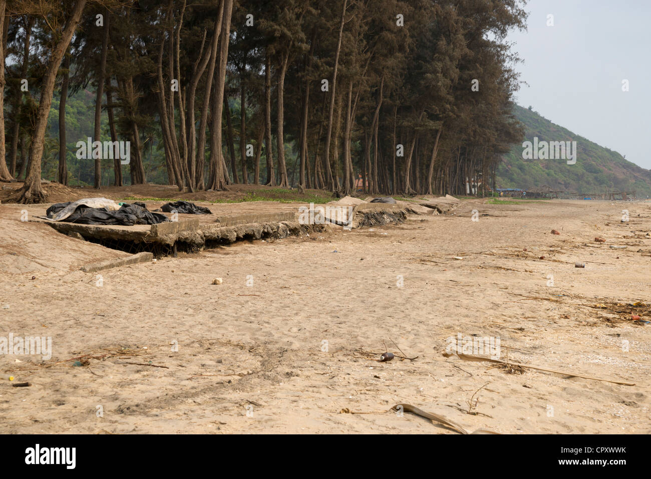 Coastal erosion a Keri Beach (Querim Beach) . The northernmost tip of ...