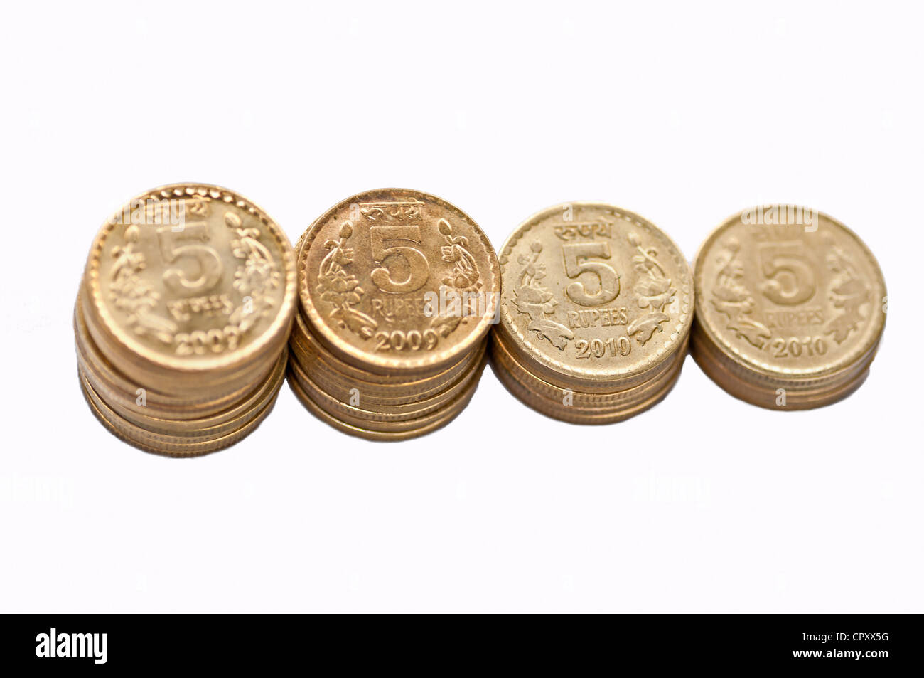 Close up of Indian Coin stack, 5 rupees, isolated on white background ...