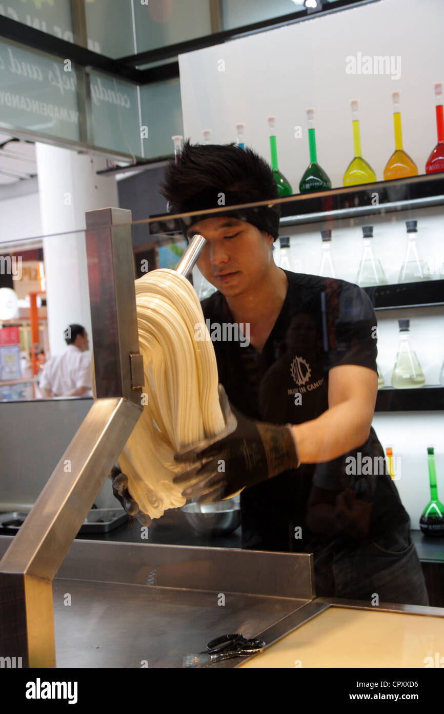 Candy maker making handmade candy , Made in candy shop in Bangkok Stock ...