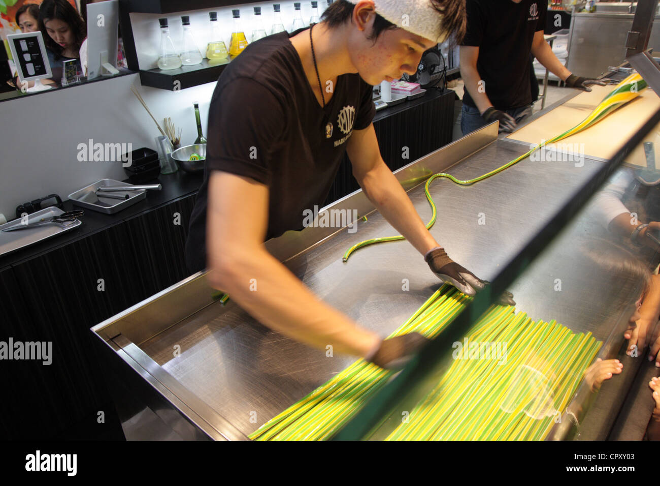 Candy maker making handmade candy , Made in candy shop in Bangkok Stock ...