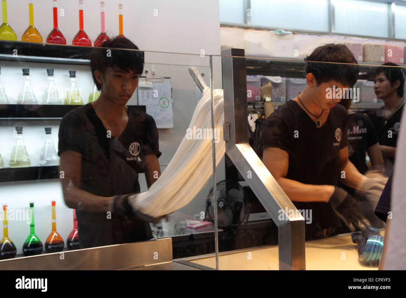 Candy maker making handmade candy , Made in candy shop in Bangkok Stock ...