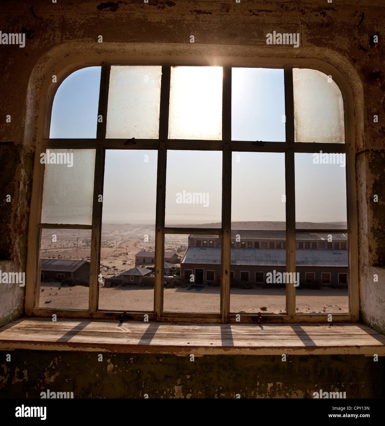Ruins of abandoned houses in the ghost diamond town Kolmanskop, Namibia ...