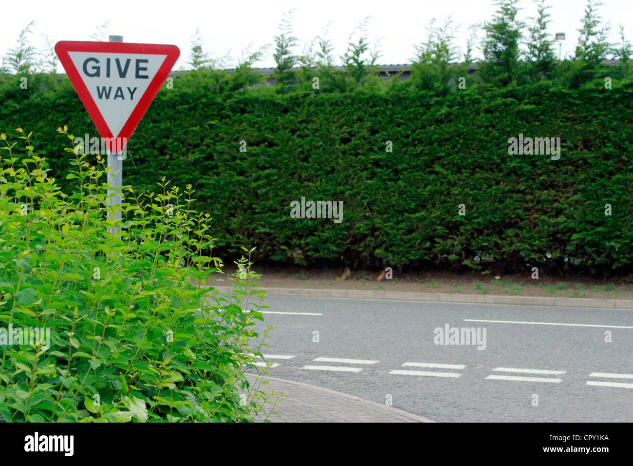 Give way sign Stock Photo - Alamy