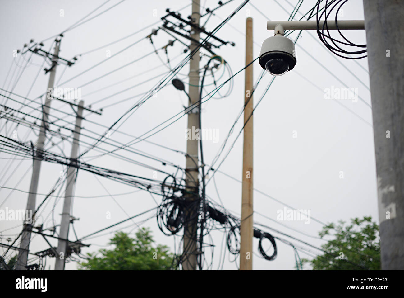 cctv camera wires cables beijing hutong china Stock Photo - Alamy