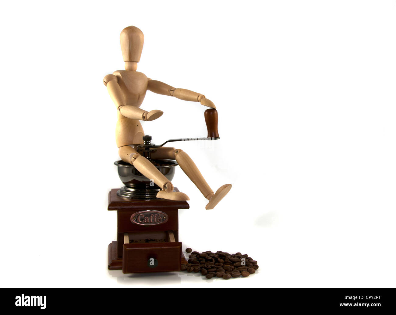 wooden puppet grind coffee on a old machine Stock Photo - Alamy