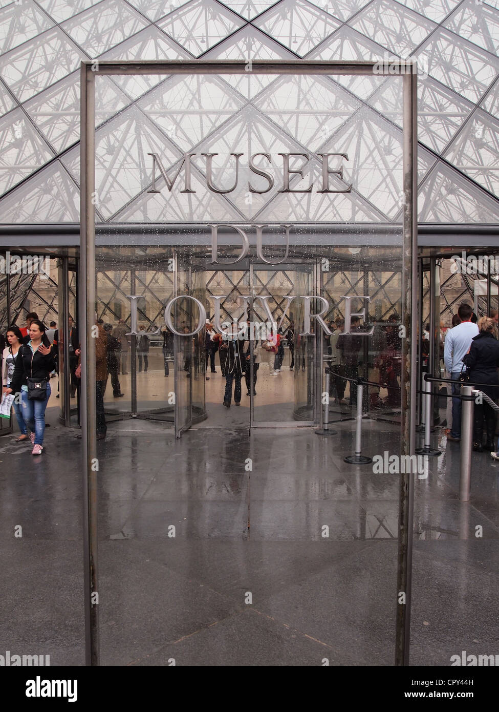 Sign and people at entrance to Musee du Louvre, Paris, France, May 10 ...