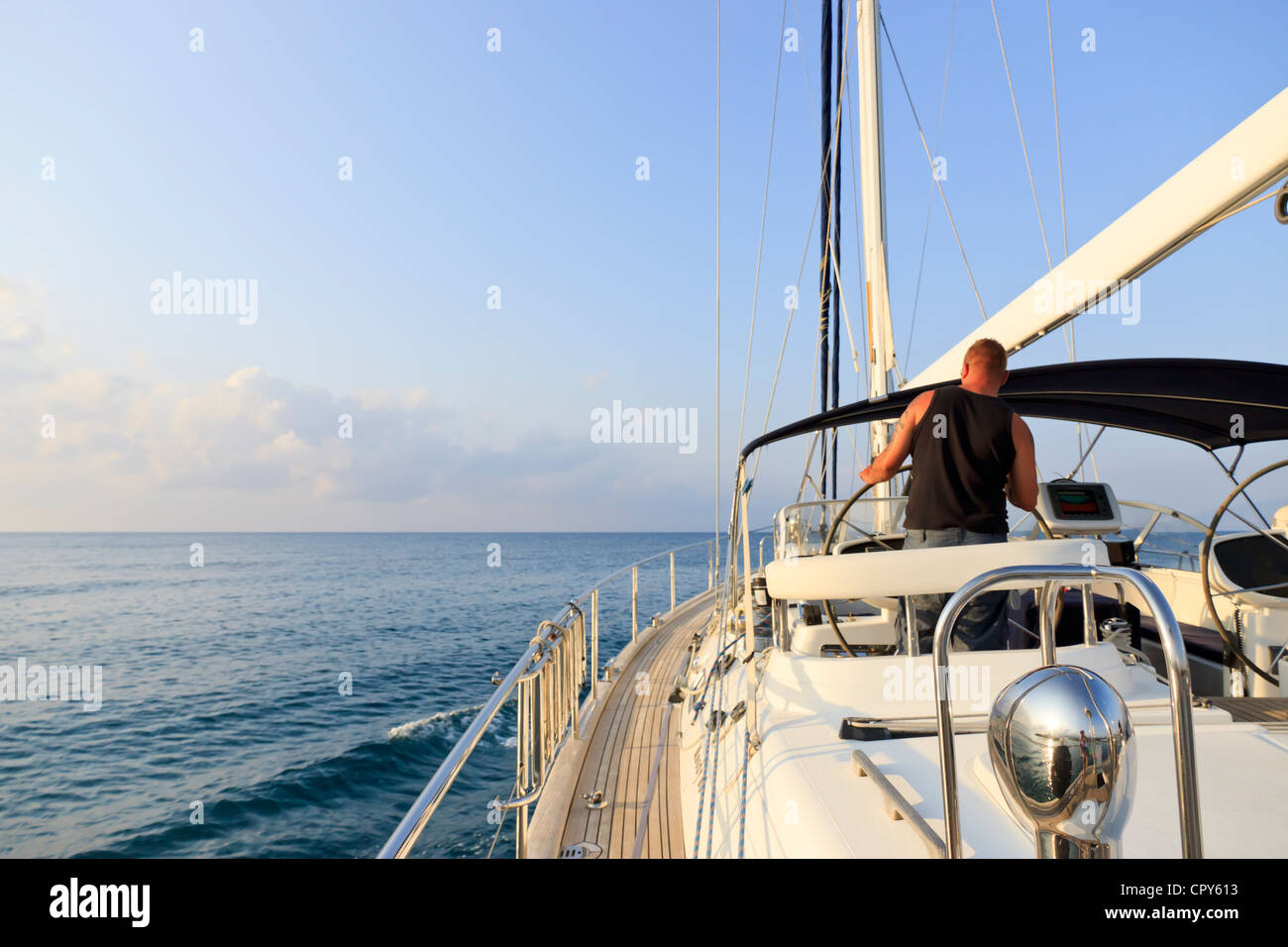 Sailing towards the sunset Stock Photo - Alamy