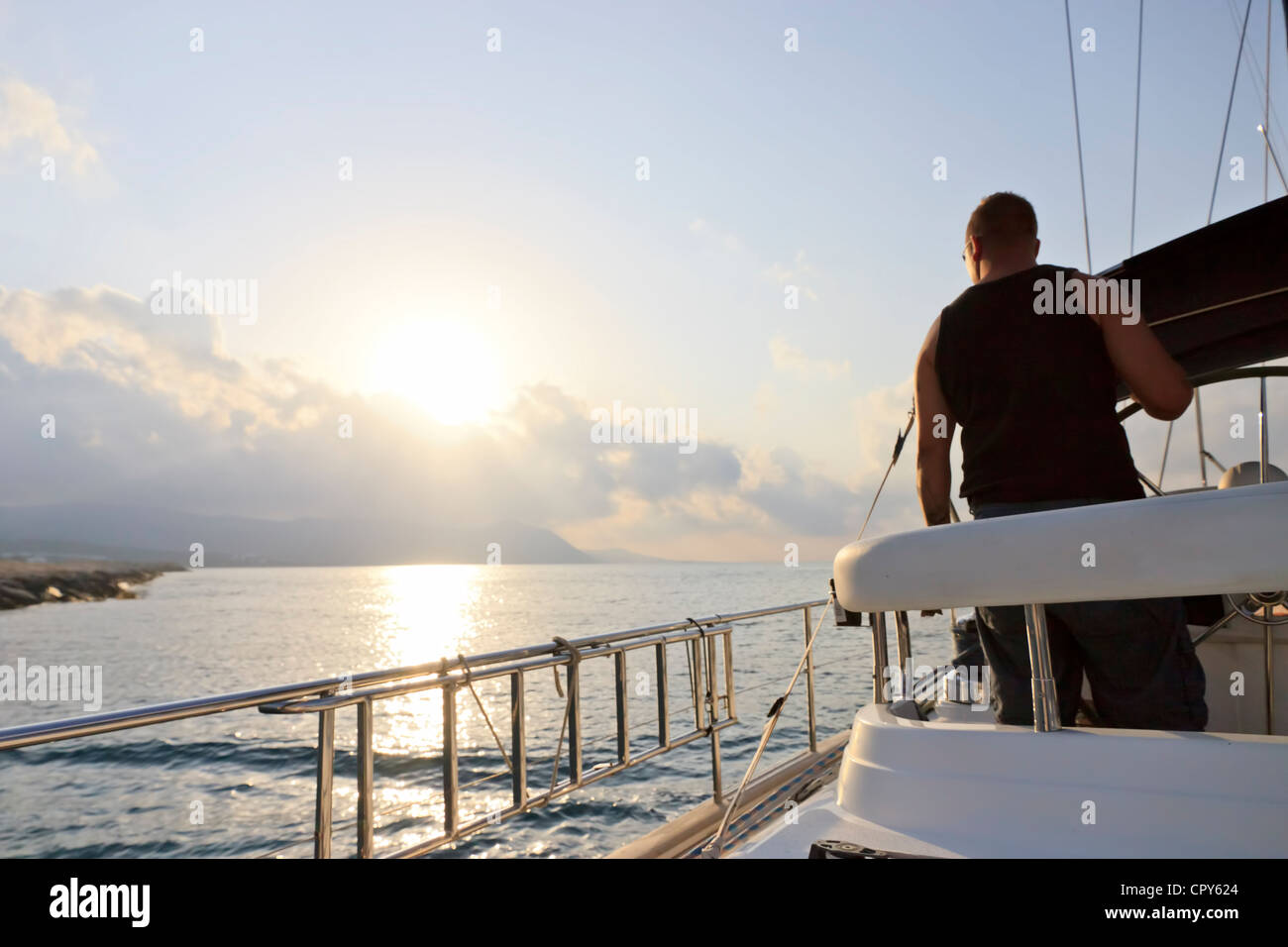 Sailing towards the sunset Stock Photo - Alamy