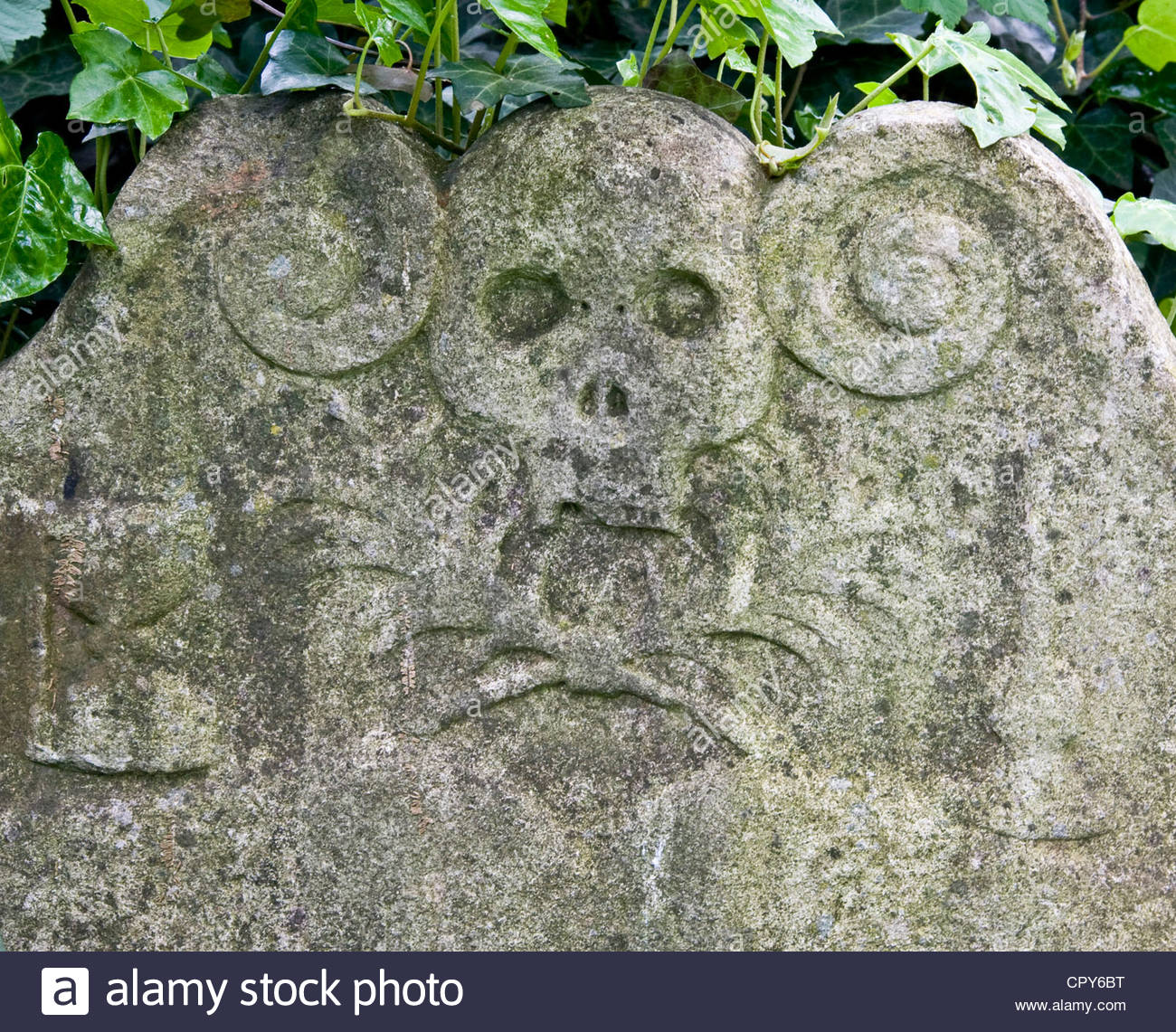 Old Ancient Grave Stone Skull Stock Photos & Old Ancient Grave Stone ...