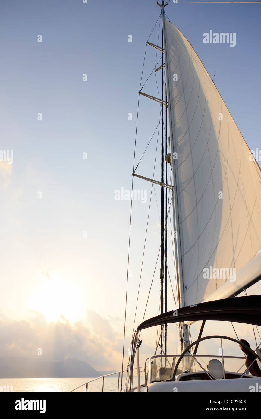 Sailing towards the sunset Stock Photo - Alamy