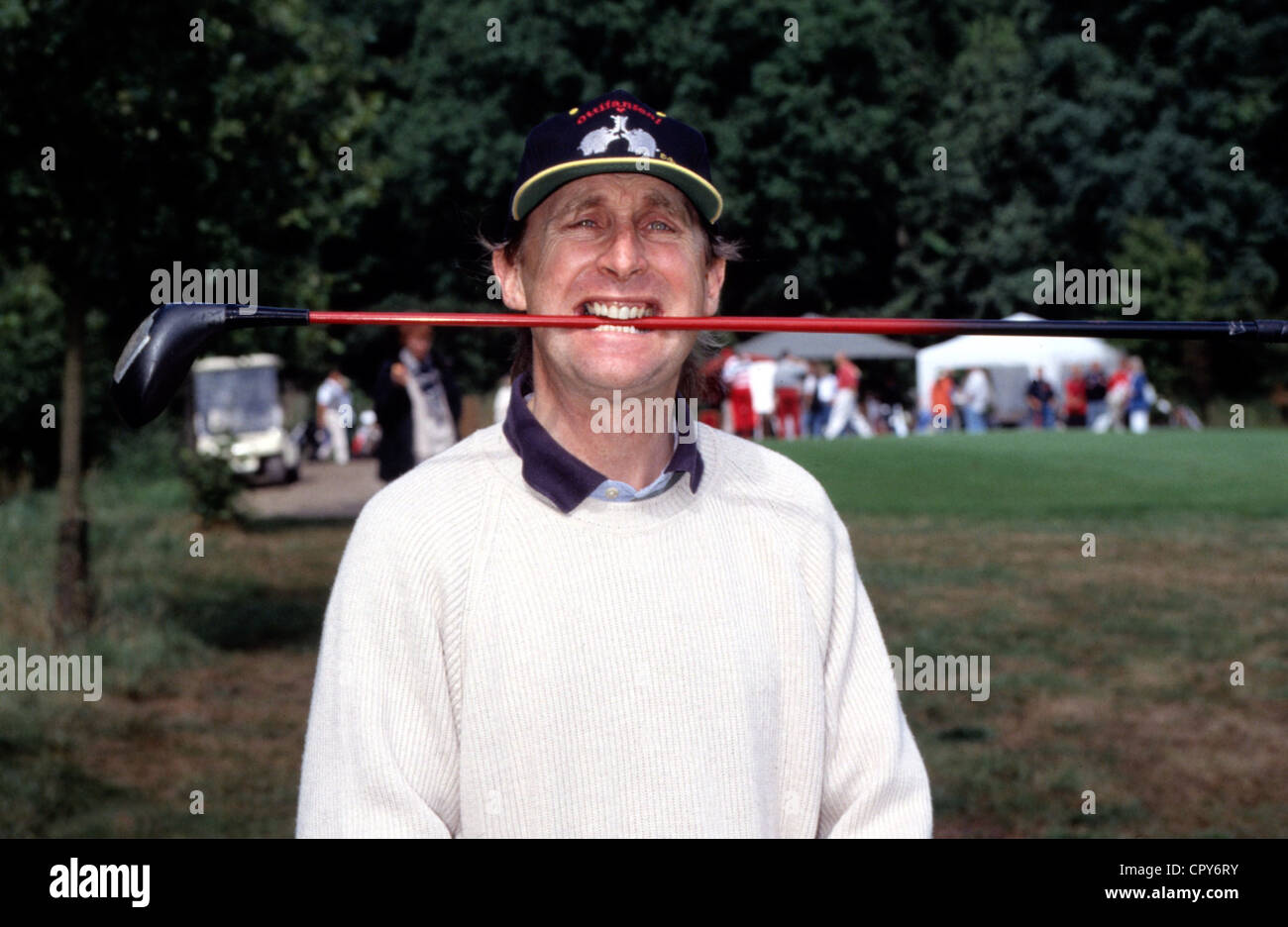 Waalkes, Otto, * 22.7.1948, German comedian, half length, with baseball ...