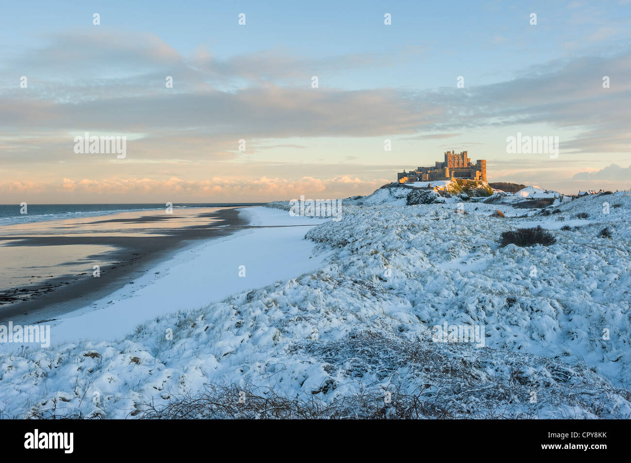 Snow on the shore, Bamburgh castle, Northumberland, UK Stock Photo - Alamy