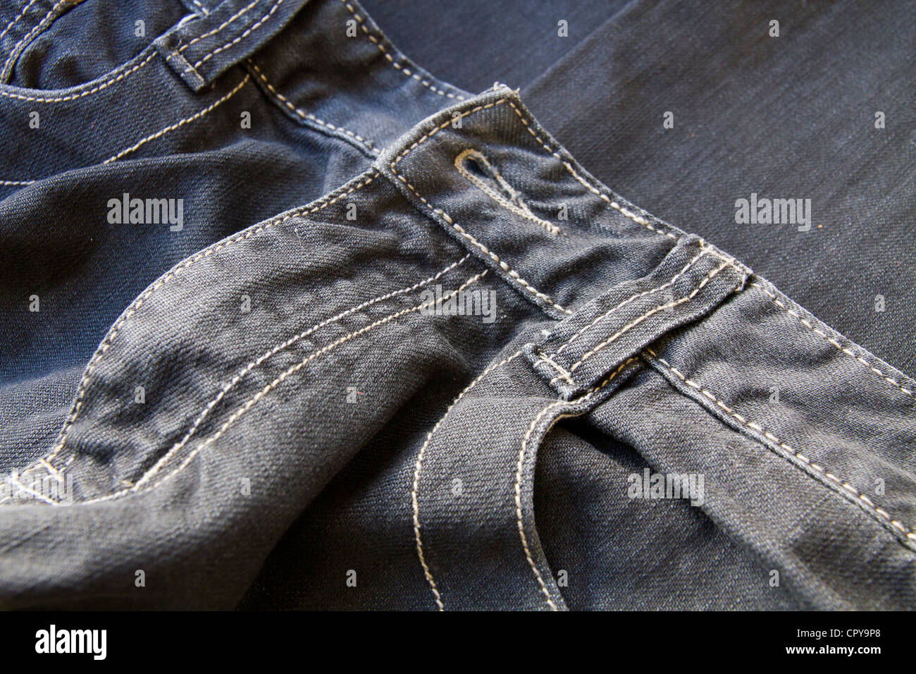 Denim jeans cloth texture pants Stock Photo - Alamy