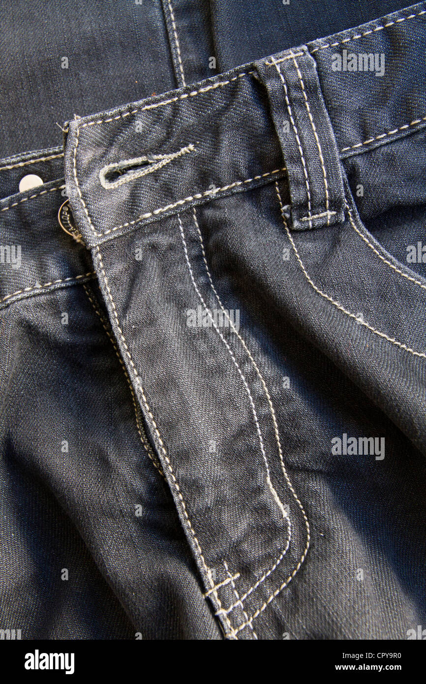 Denim jeans cloth texture pants Stock Photo - Alamy