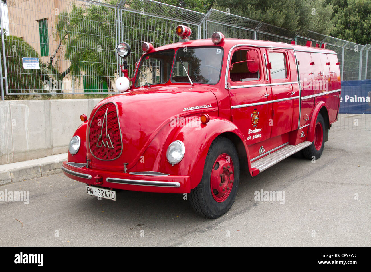Ancient fire brigade engine displayed on outdoor event in Palma de ...