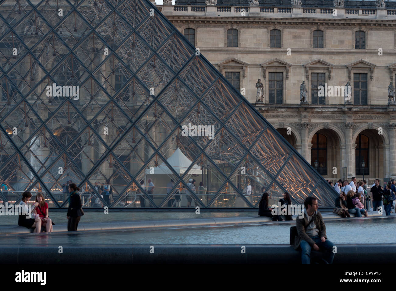 Palais du louvre at dusk hi-res stock photography and images - Alamy