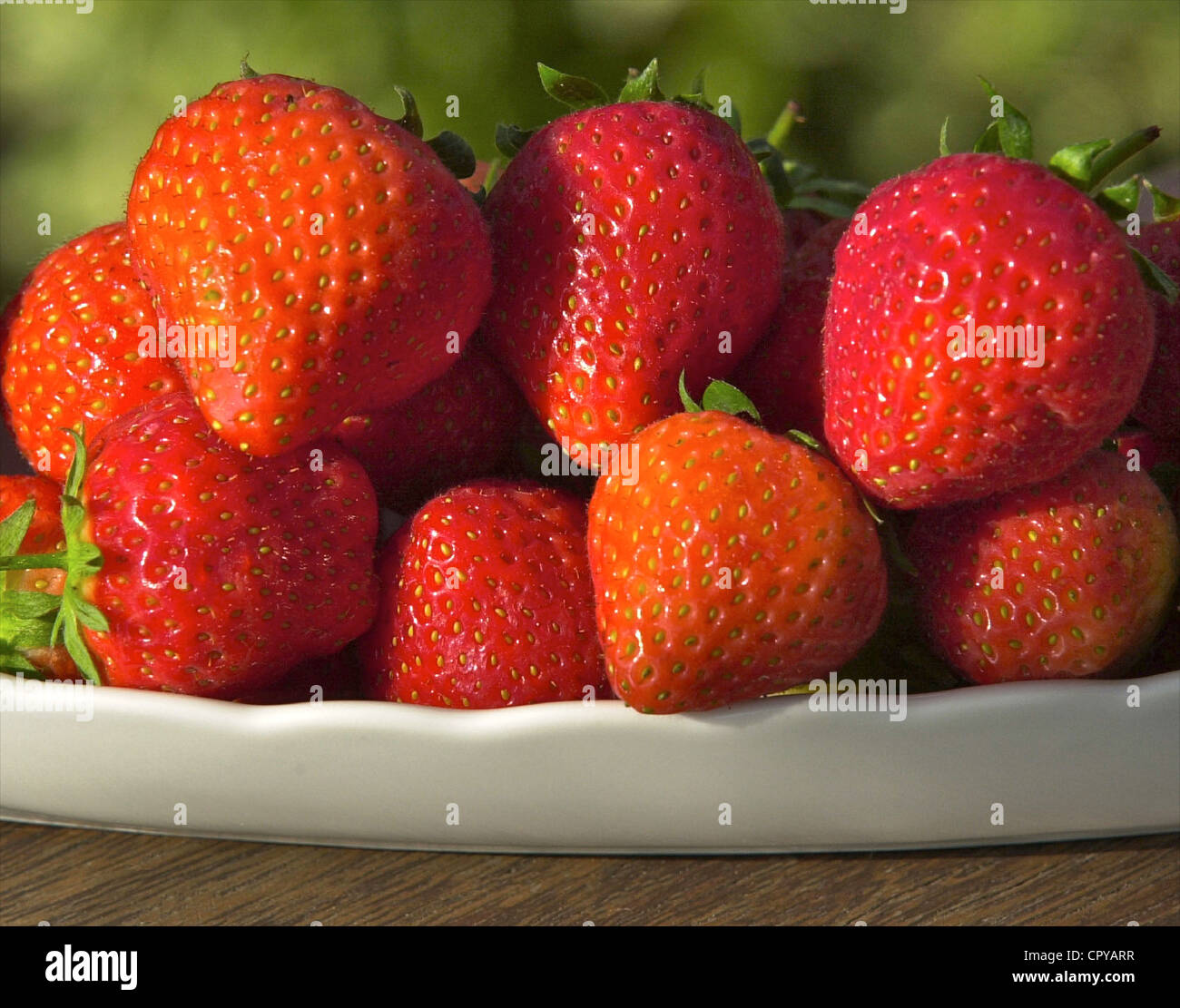 Strawberries strawberrys strawberry hi-res stock photography and images ...