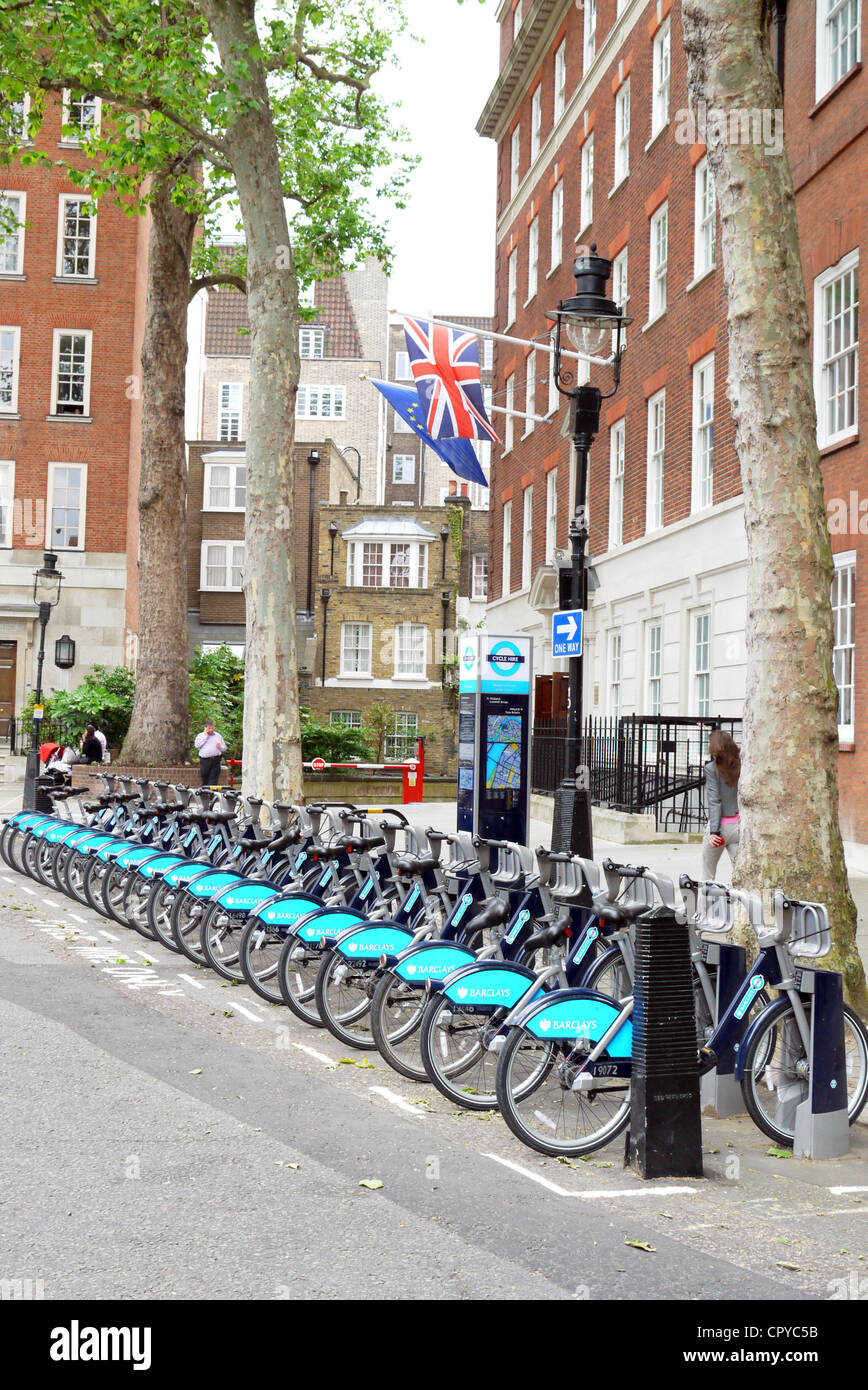 Boris Bikes underneath a Union Jack Flag Stock Photo - Alamy