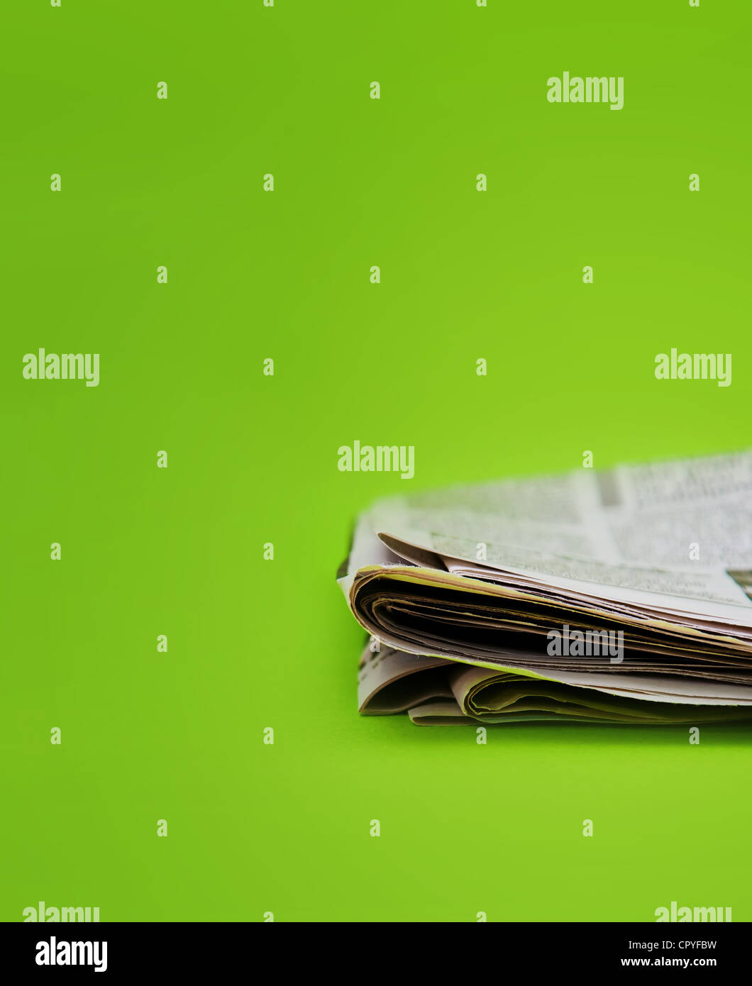 Folded newspaper, close up image Stock Photo - Alamy