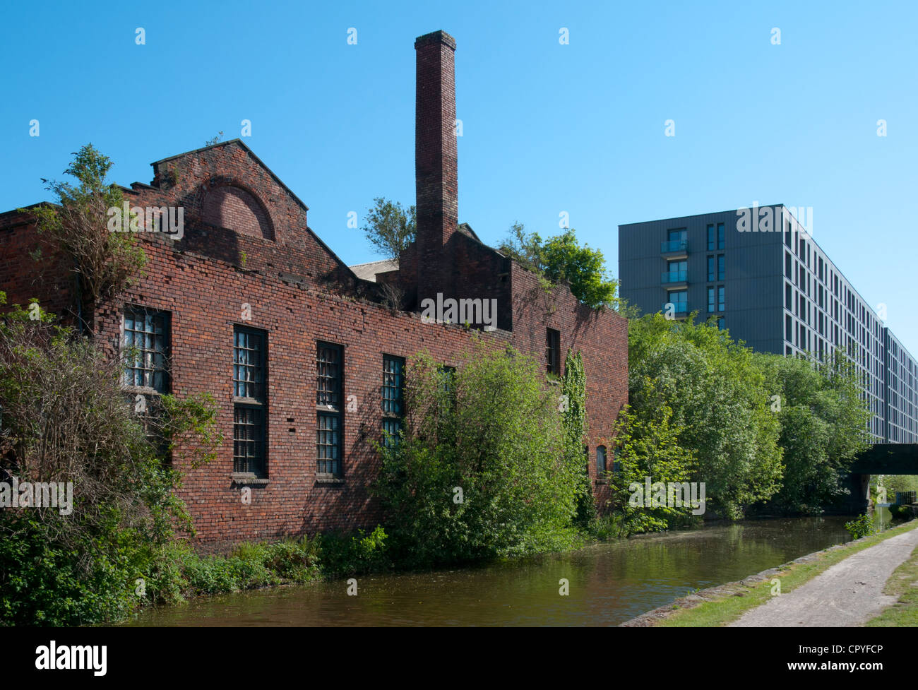 Derelict factory and the Milliner's Wharf apartments. By the Ashton ...