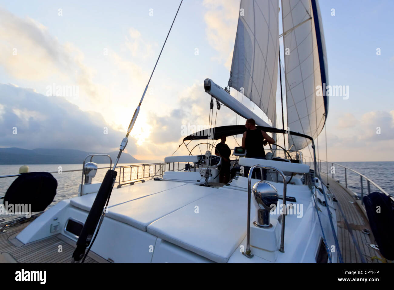 Sailing towards the sunset Stock Photo - Alamy