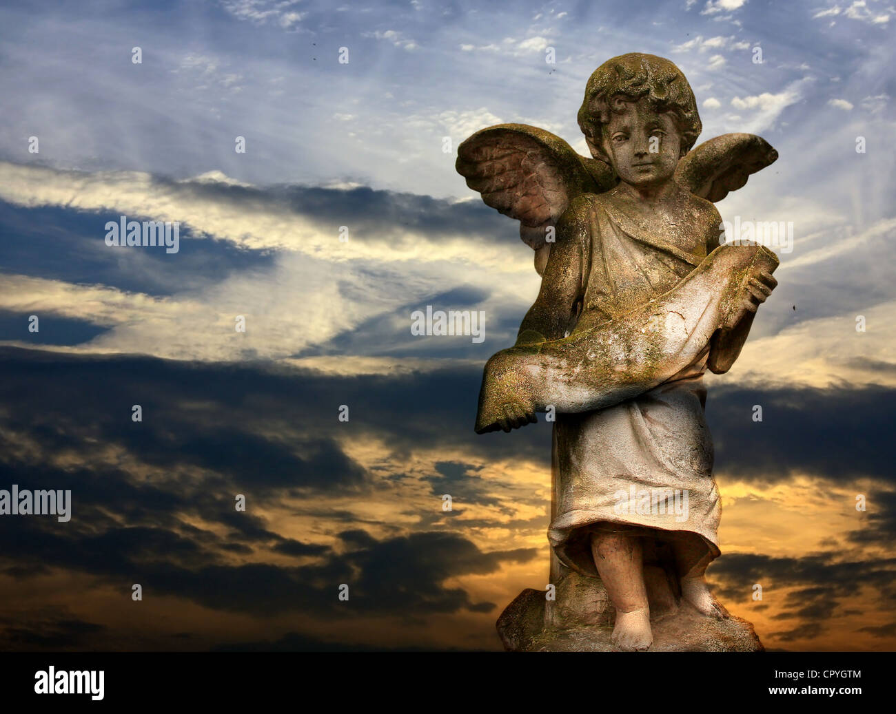 Angel and sunset abstract religion background Stock Photo - Alamy
