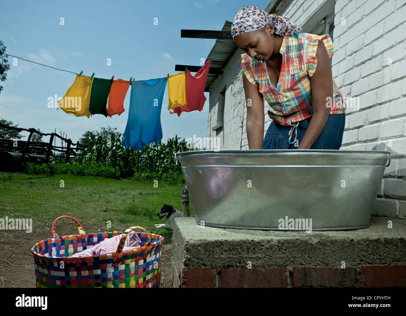 Black female hand washes clothing outside her rural home Stock Photo ...