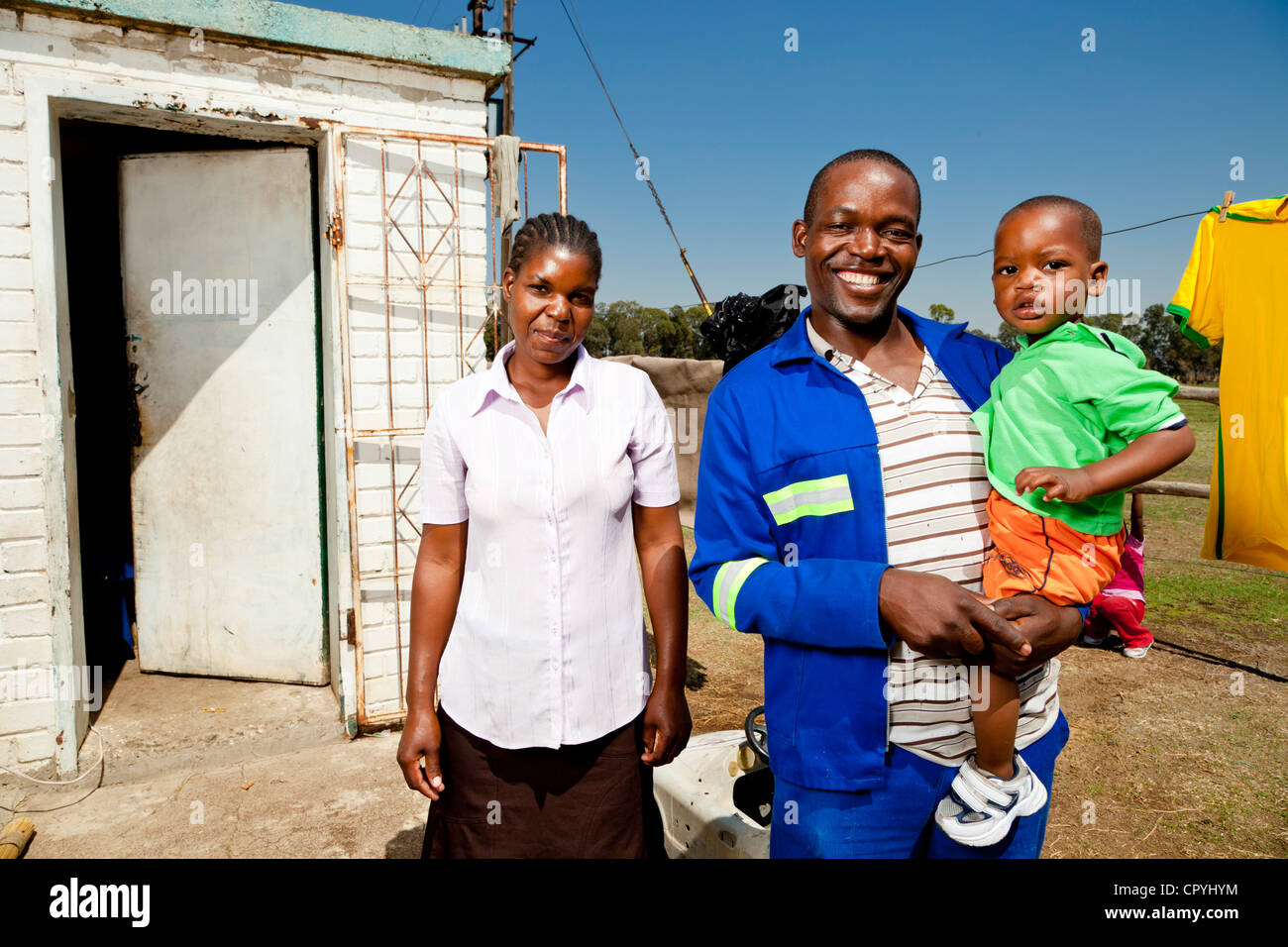 African family standing outside rural hi-res stock photography and ...