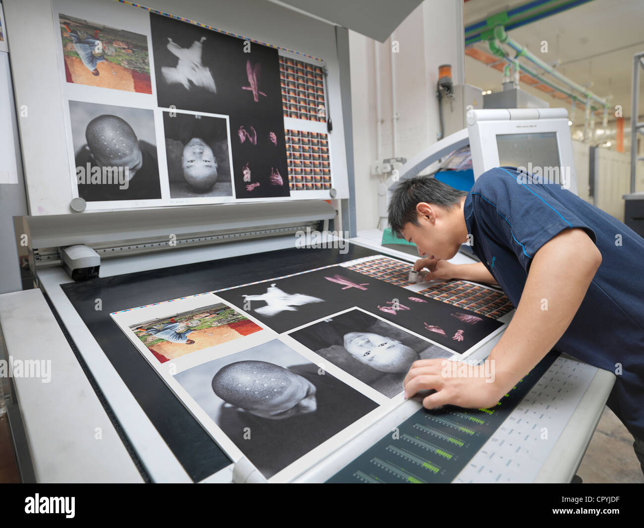 A full scale printing press in Singapore Stock Photo - Alamy