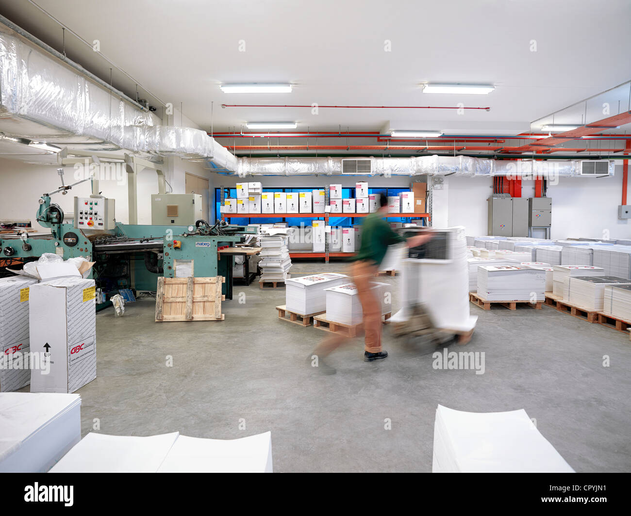 A full scale printing press in Singapore Stock Photo - Alamy