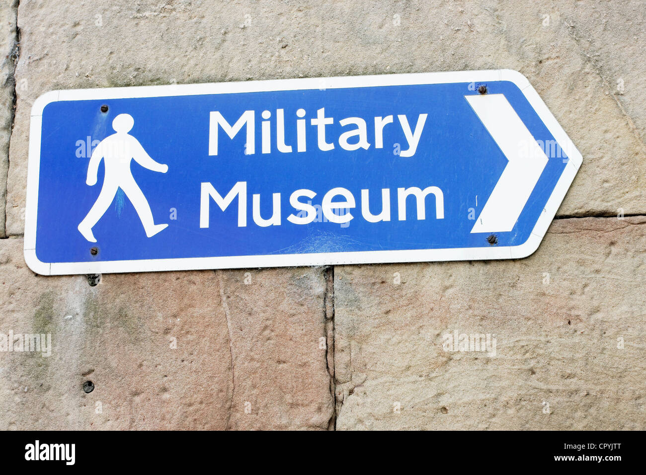 A tourist sign showing the way to Military Museum Stock Photo - Alamy