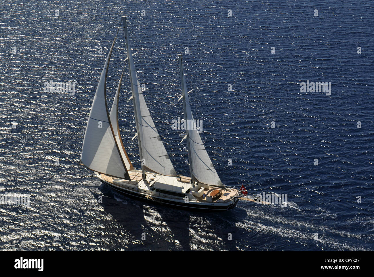 Aerial photograph of luxury wooden sailboat, sailing at the ...