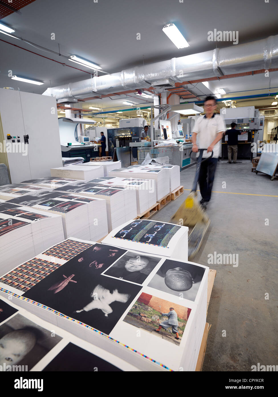 A full scale printing press in Singapore Stock Photo - Alamy