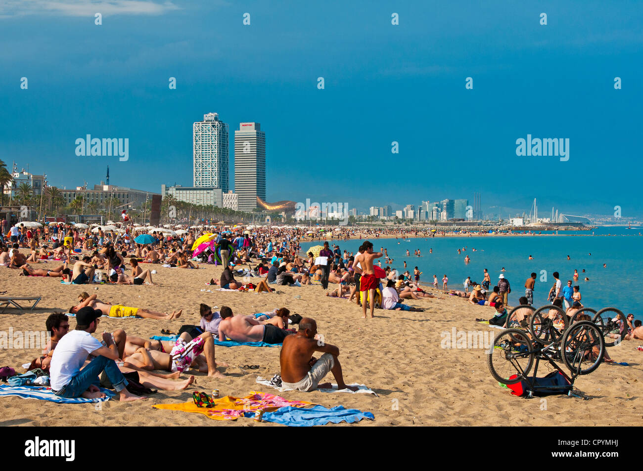 Summer view of the sandy beach in Barceloneta, Barcelona, Catalonia ...