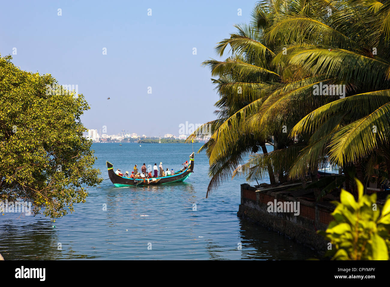 India, Kerala State, Kochi (Cochin), transport dugout canoes between ...