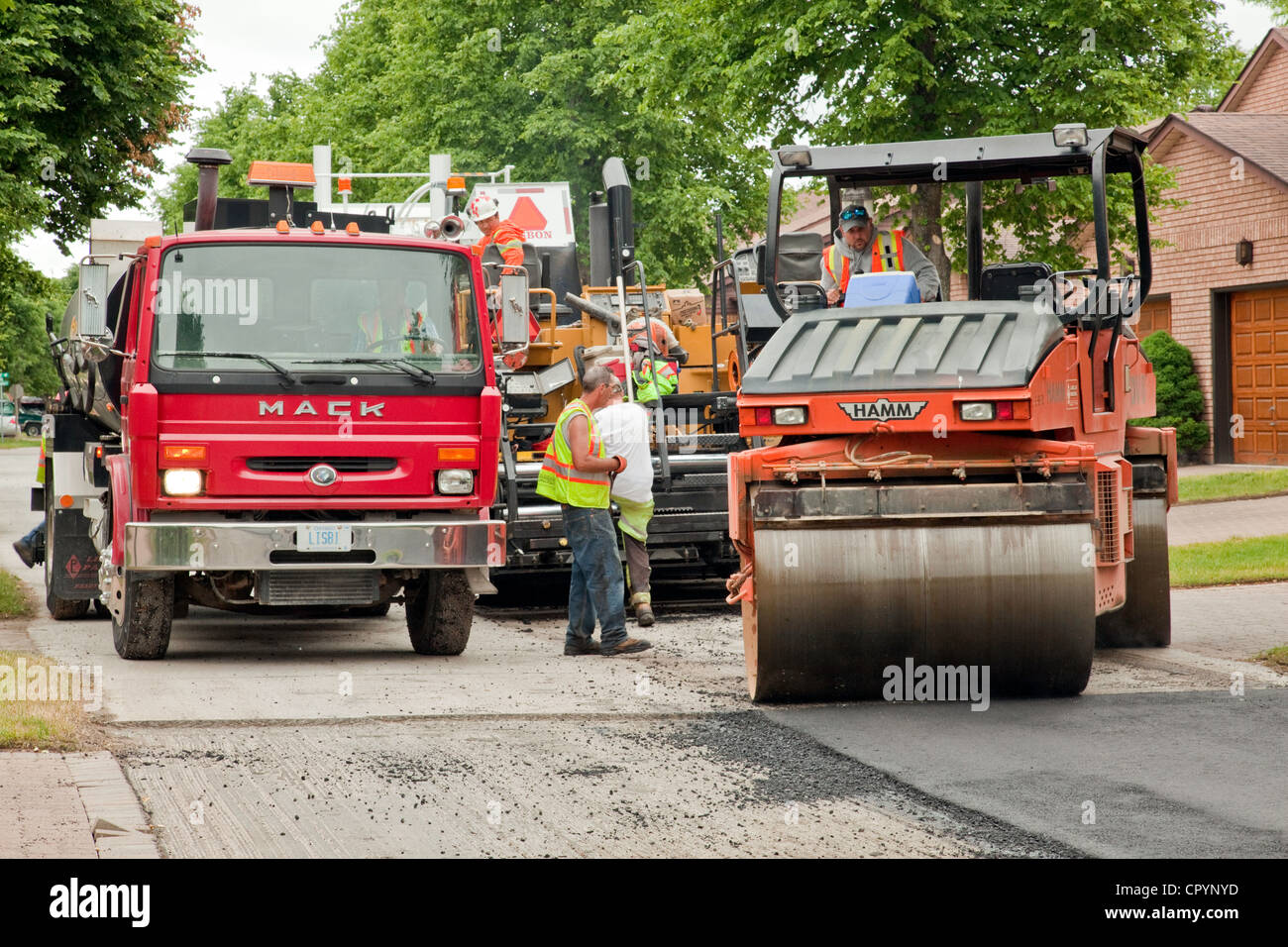 Road surfacing in residential hi-res stock photography and images - Alamy