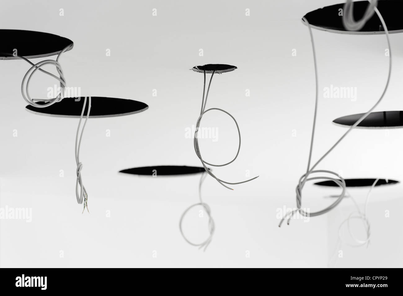 Power cables hang from the ceiling hi-res stock photography and images ...