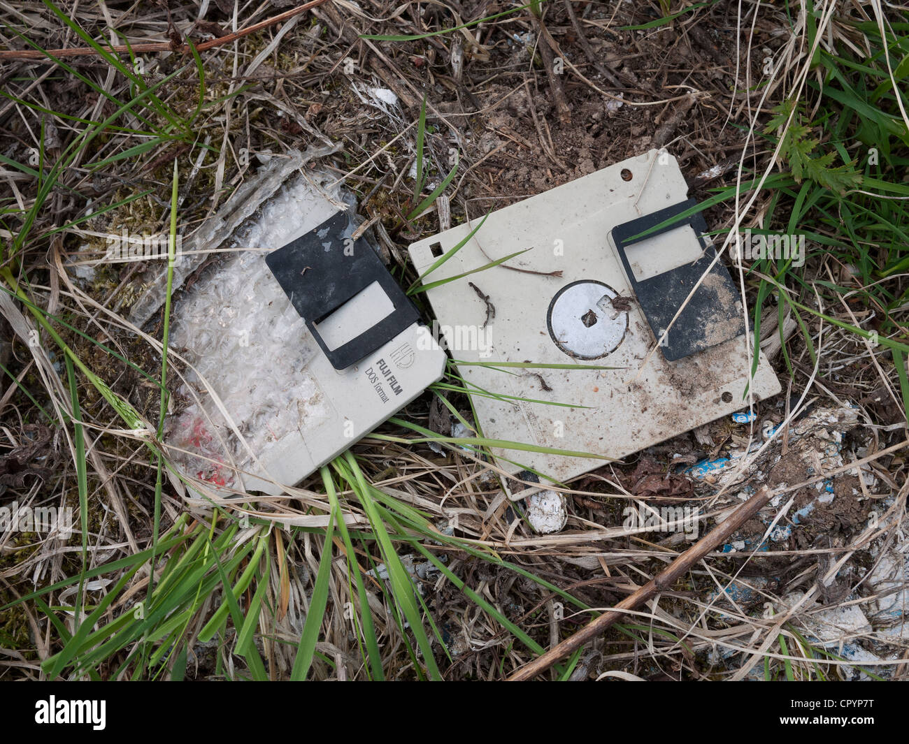 Old discarded floppy discs, data garbage lying in the grass Stock Photo ...
