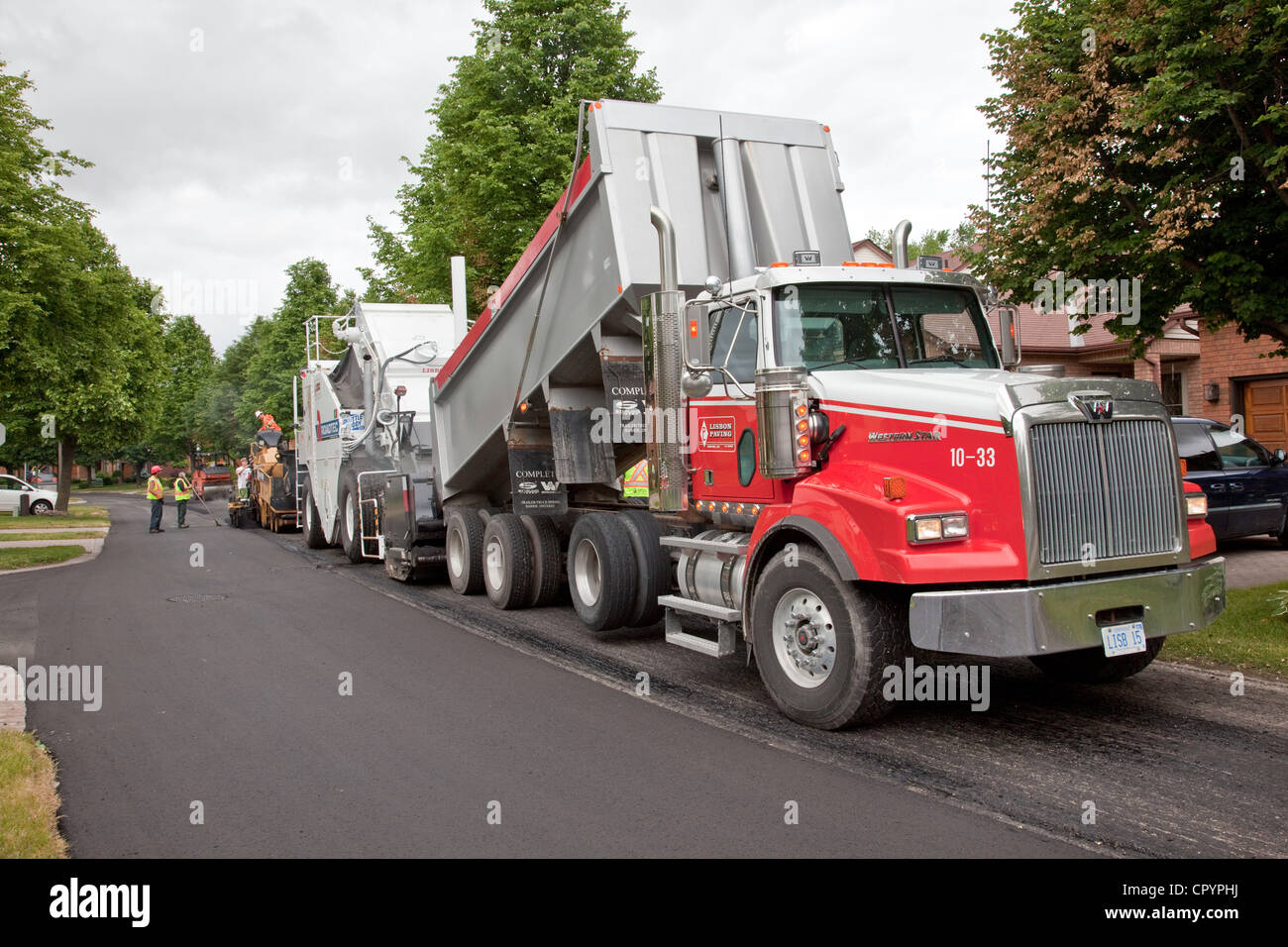 Road surfacing in residential hi-res stock photography and images - Alamy
