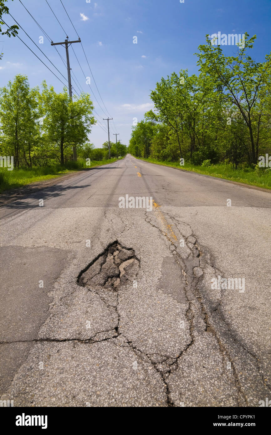 Asphalt road with pothole in the countryside, Quebec, Canada Stock ...