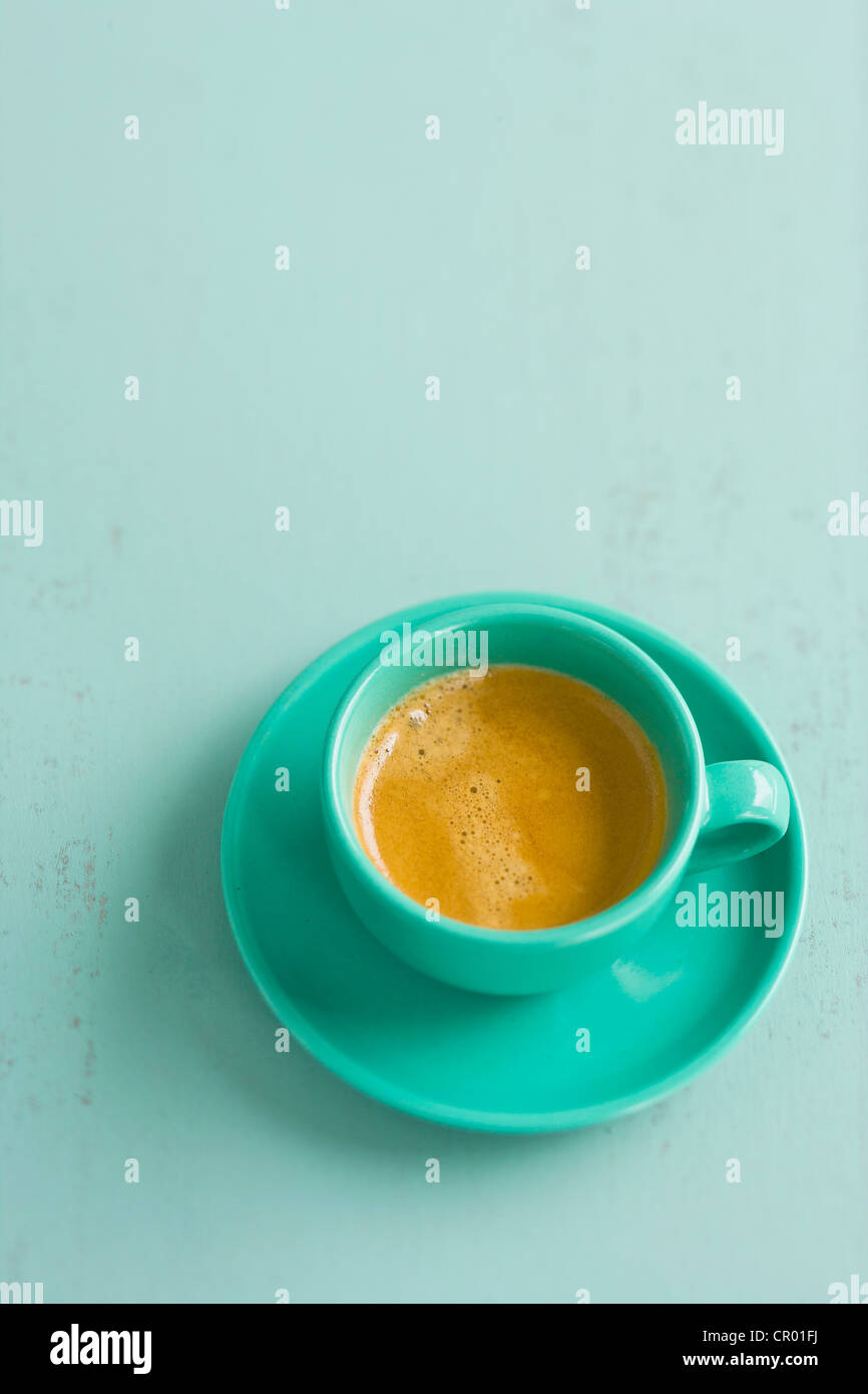 Cup of soup in saucer Stock Photo - Alamy