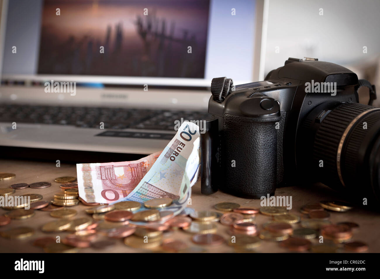 Money, camera, computer, earning money through selling photos Stock ...