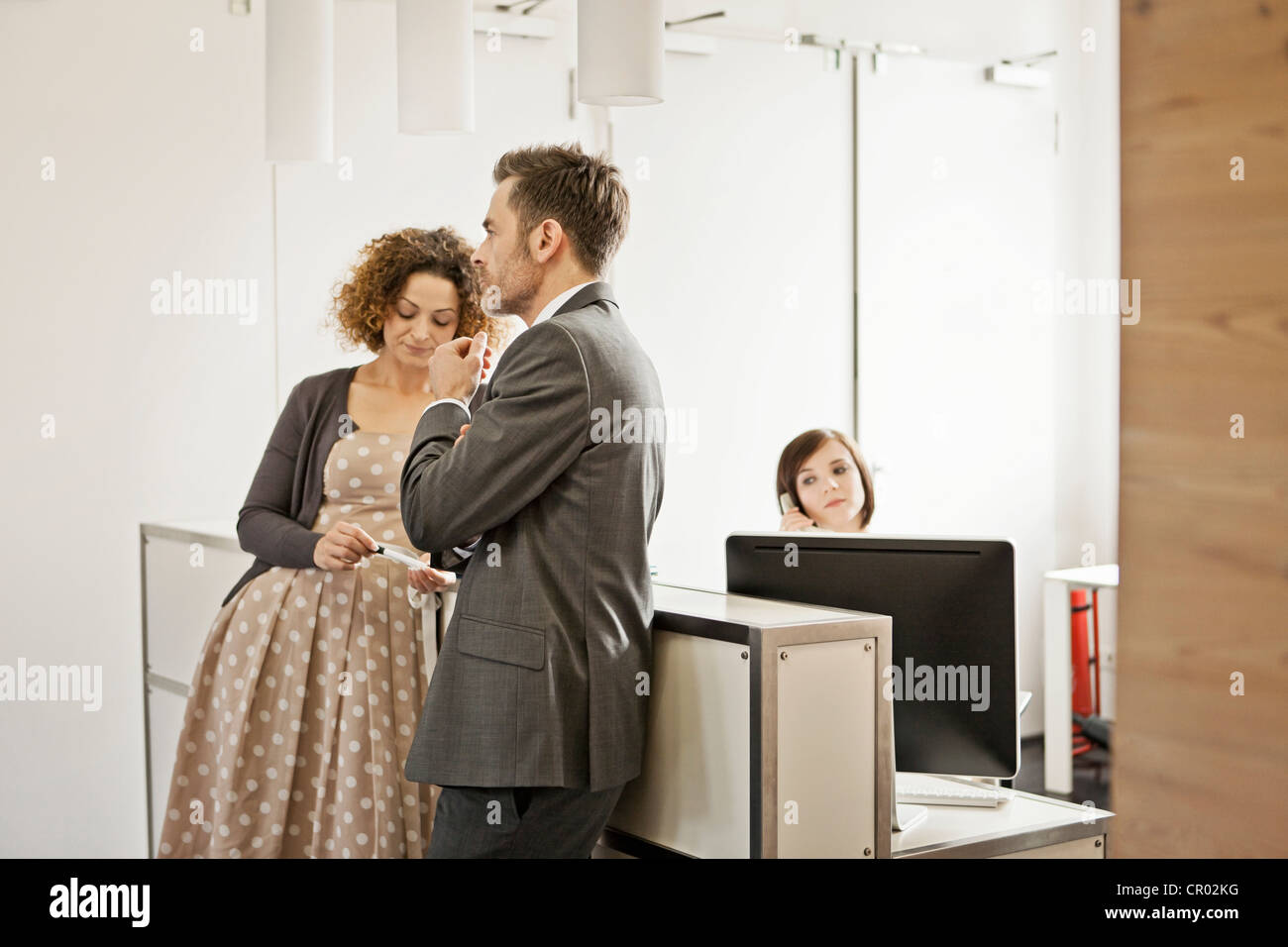 Business people working in office Stock Photo - Alamy