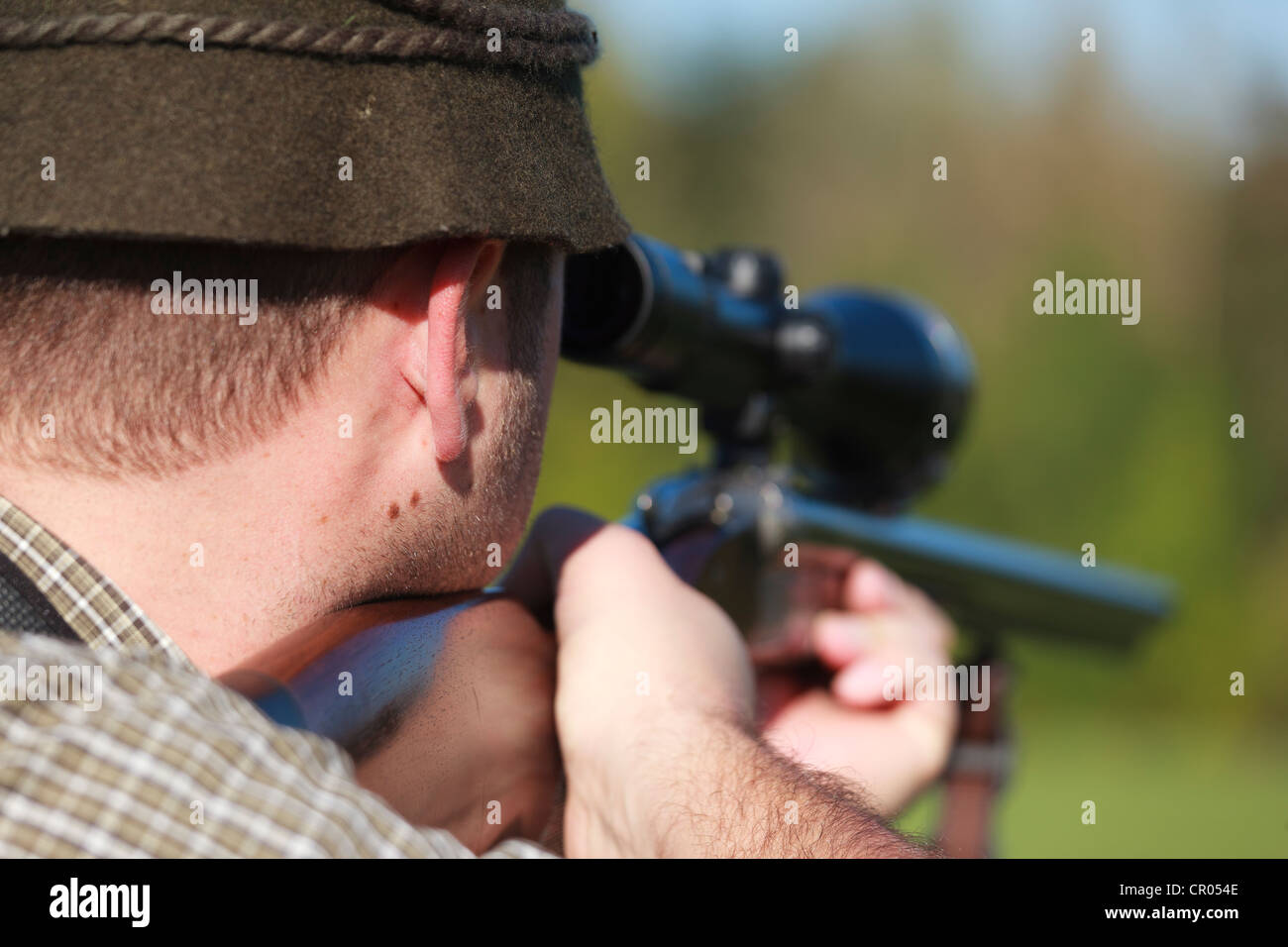 Hunter with game in his sights Stock Photo - Alamy