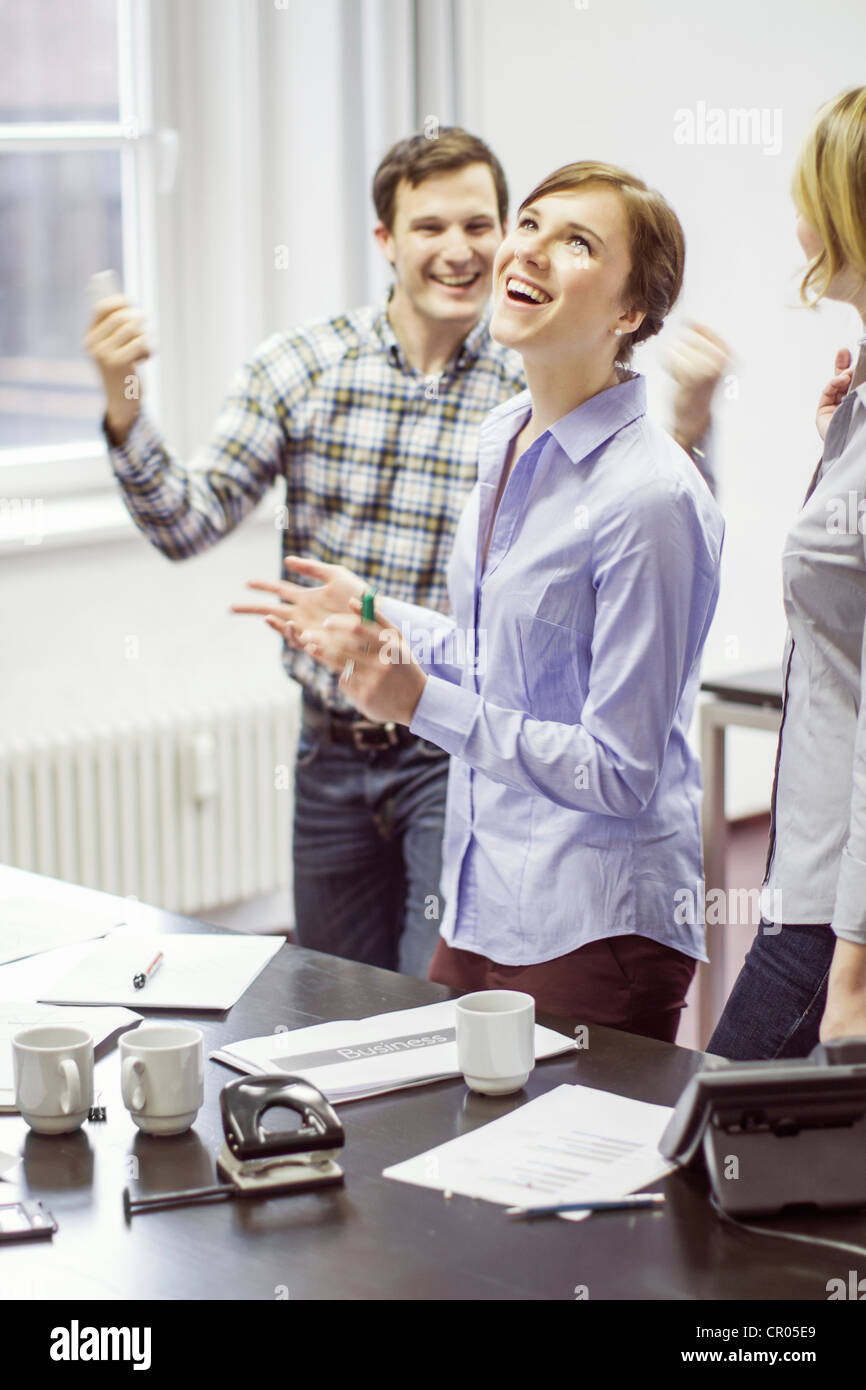 3 men table laughing hi-res stock photography and images - Alamy