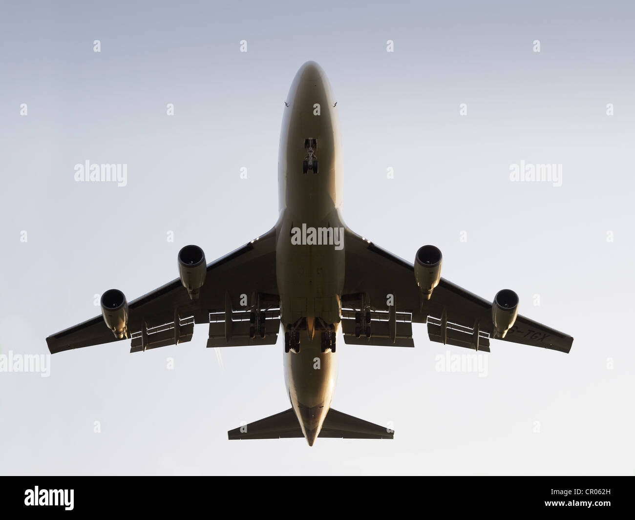 Jumbo Jet Boeing 747 viewed from below on landing approach, Frankfurt ...
