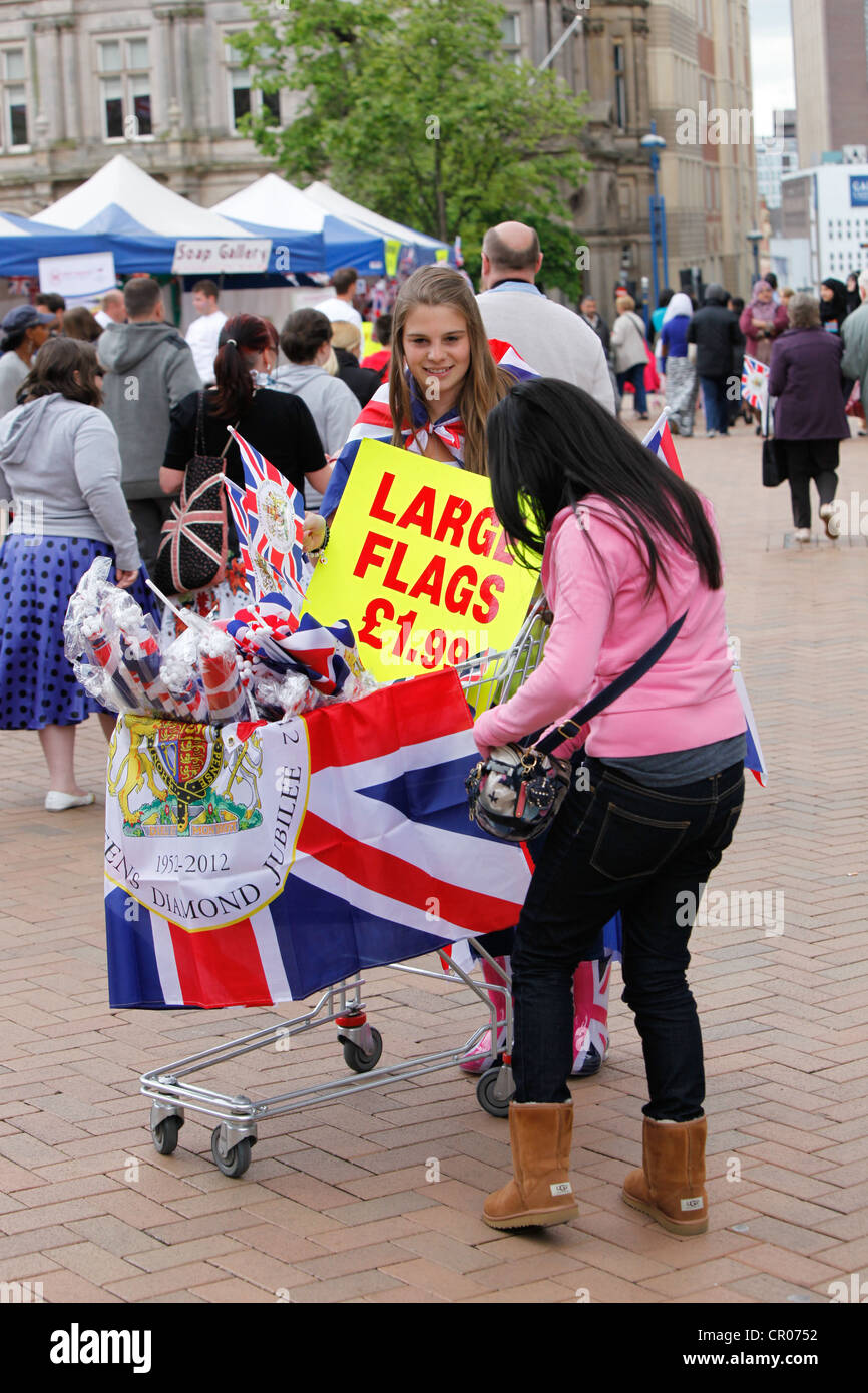 Selling flags and souvenirs from a supermarket trolley during the the ...